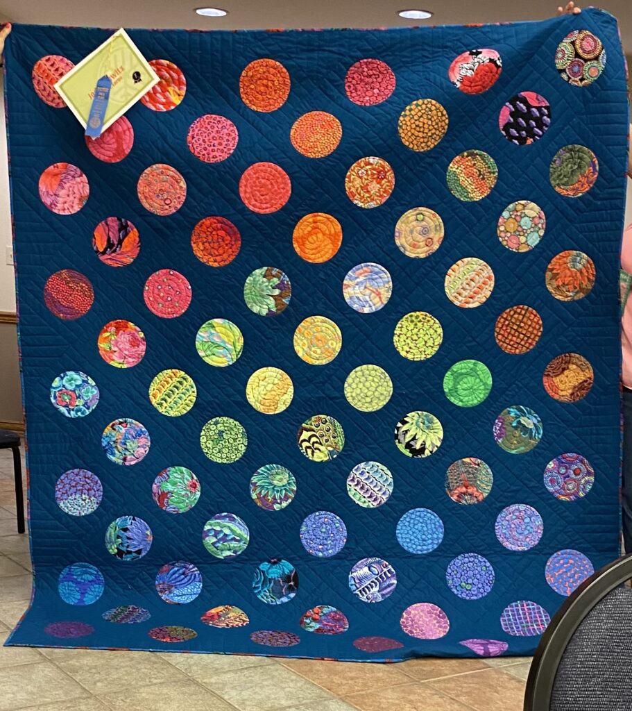 Raffle Quilts - Oconomowoc Quilters Guild